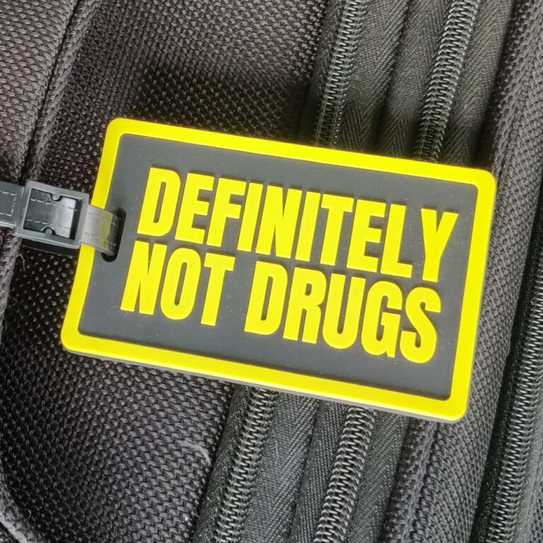 Definitely Not Drugs - Luggage Tag - Taxation Is Theft